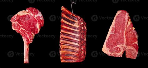 Different Cuts Of Raw Beef Arranged Against A Black Background 69427550