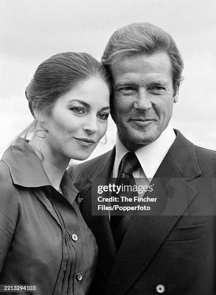 British Actors Barbara Kellerman And Roger Moore Posing During A