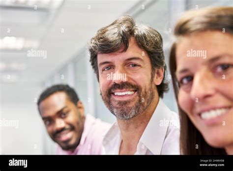 Three Young Business People As A Successful International Start Up Team