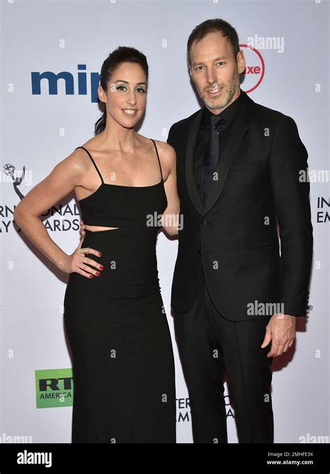Catherine Reitman Left And Philip Sternberg Arrive At The 47th