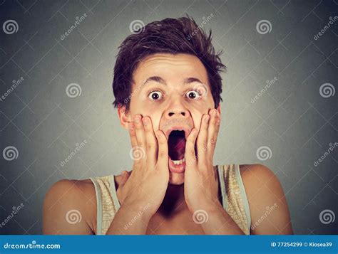 Shocked Surprised Man With Hands On Face Screaming Stock Image Image