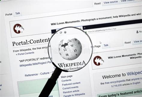 Wikipedia Home Page Under Magnifying Glass Editorial Image Image Of