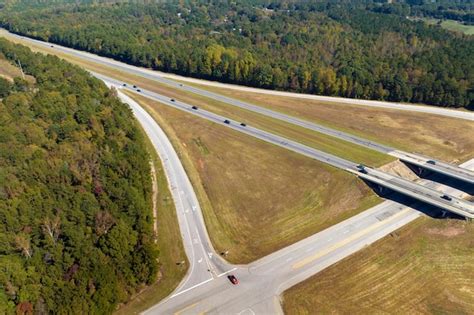 Premium Photo Aerial View Of Freeway Overpass Junction With Fast