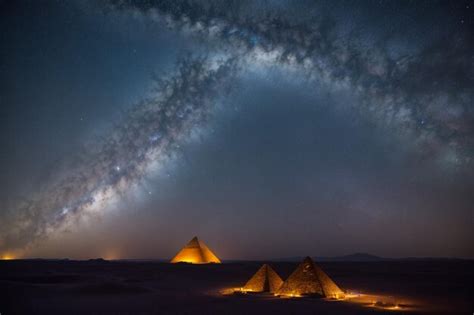 Premium Ai Image Ancient Pyramids Of Giza At Night Against The Stars