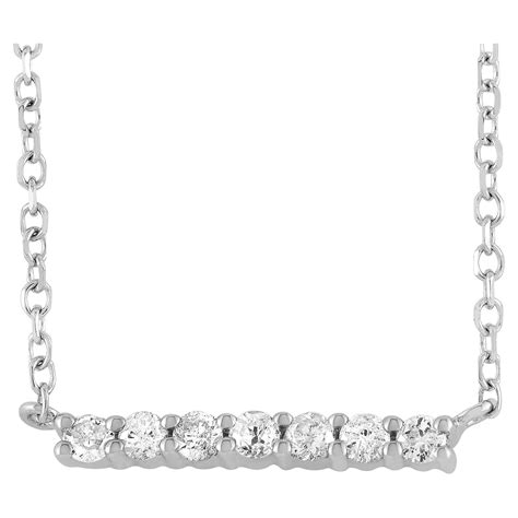 Lb Exclusive 14k White Gold 010 Ct Diamond And Sapphire Pendant