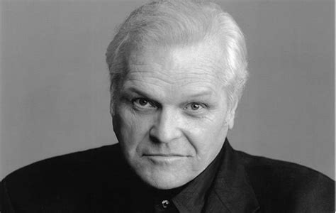 Download Legendary Actor Brian Dennehy In Front Of A Gray Background