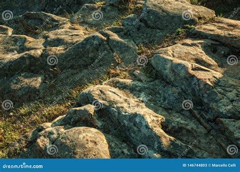 Eroded Rocks With Green Grass On Sunset Stock Image Image Of Mineral