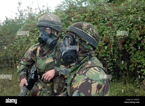 British Solders In Nbc Chemical Warfare Suits During A Training