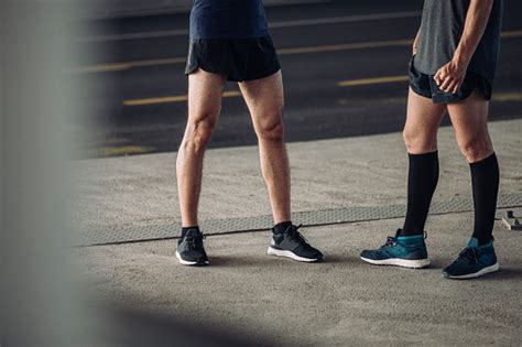 City Runners Two Unrecognizable Men In Sportswear Standing On The