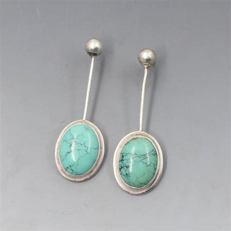 Turquoise And Silver Statement Earrings