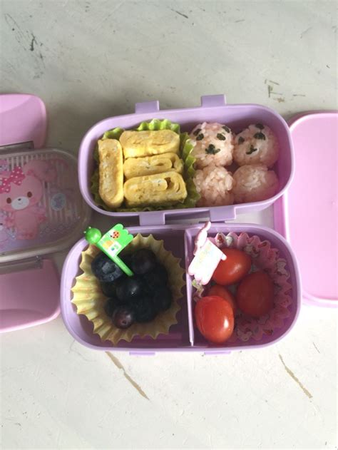 Mini Rice Balls With Fruits Eggs And Cherry Tomatoes Cherry