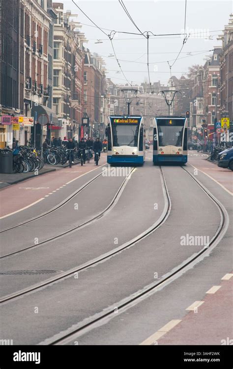 Amsterdam Netherlands February 9 2025 Two Modern Trams Driving