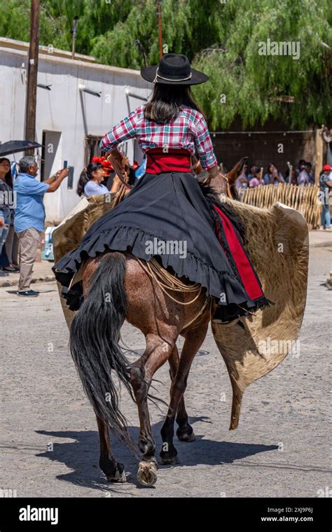A Female Gaucho In Traditional Dress In A Parade In Cachi Argentina
