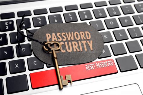 Vintage Key With Tag On Laptop Closeup Password Security Concept