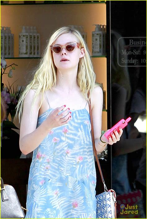 Elle Fanning Switches From Casual To Chic For Monday Outings Photo