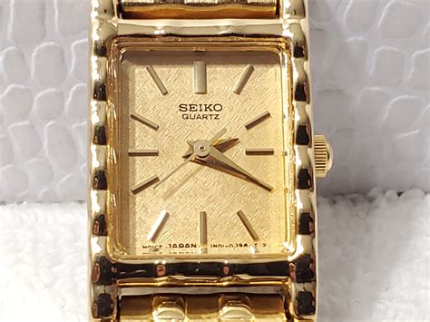 Vintage Seiko Womens Gold Tone Tank Quartz Watch Stainless Steel Base