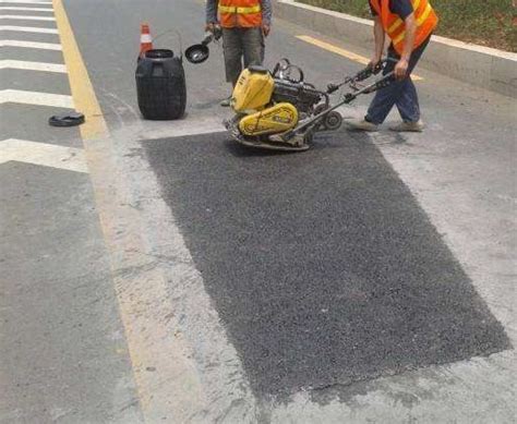 重庆沥青路面施工单位沥青路面施工队道路修补 重庆靖海市政工程有限公司