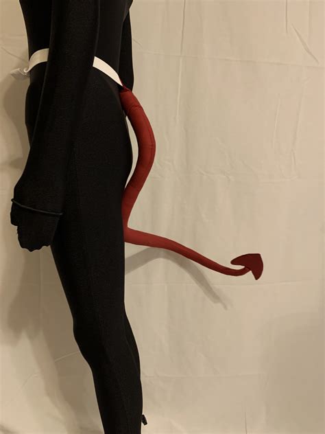 Jester Tail Curved Curled Spiral Tail With Spade Spear Pointed Tail