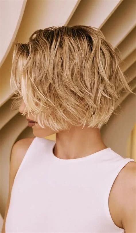 45 Chic Layered Bob Haircuts Textured Tousled Bob With Curtain Bangs
