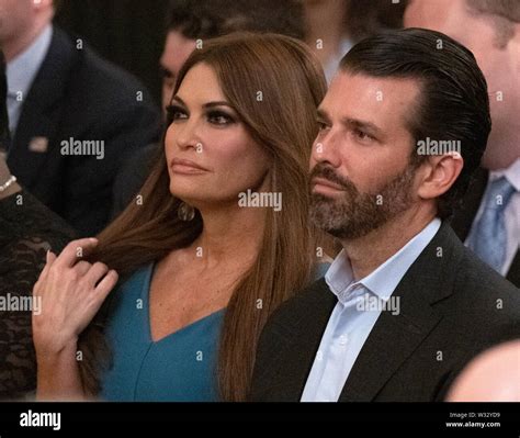 Donald J Trump Jr Right And Kimberly Guilfoyle Left Listen As