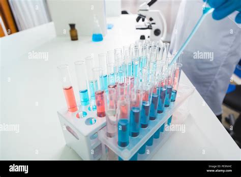 Vials For Science Close Up Of Many Vials Filled With Red And Blue