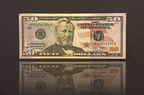พื้นหลัง50 ดอลลาร์อเมริกันได้รับการยอมรับจาก 50 ดอลลาร์สหรัฐ รูปถ่าย