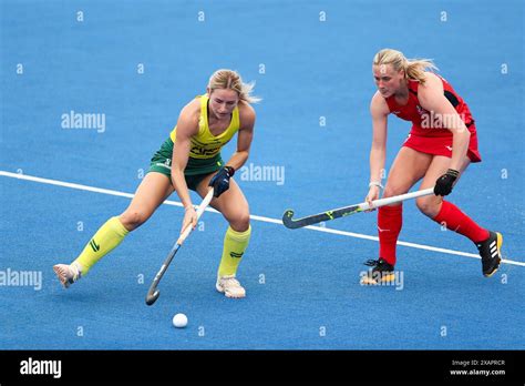 Great Britains Sophie Hamilton Battles For The Ball Against Australias Claire Colwill During