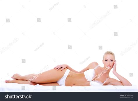 Woman Lying On Bed Full Length Over 2449 Royalty Free Licensable