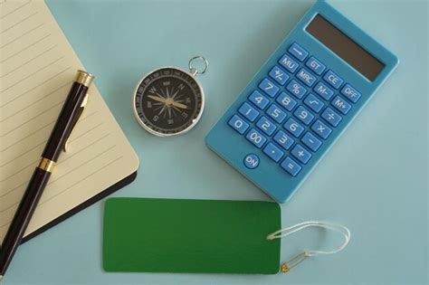 Premium Photo Compass And Stationery On Blue Background