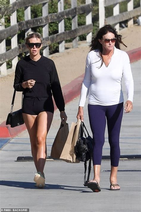 Caitlyn Jenner And Partner Sport Clingy Athletic Wear As They Grab