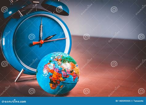 Retro Alarm Clock With A Small World Globe Ball Symbolizing Earth Hour