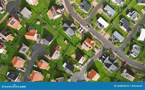 Aerial Shot Of A Holiday Home Complex With Similar Tiny Houses Stock
