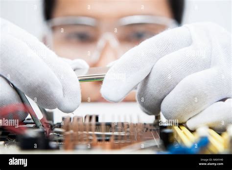 Expert Engineers Examining Computer Equipment Stock Photo Alamy