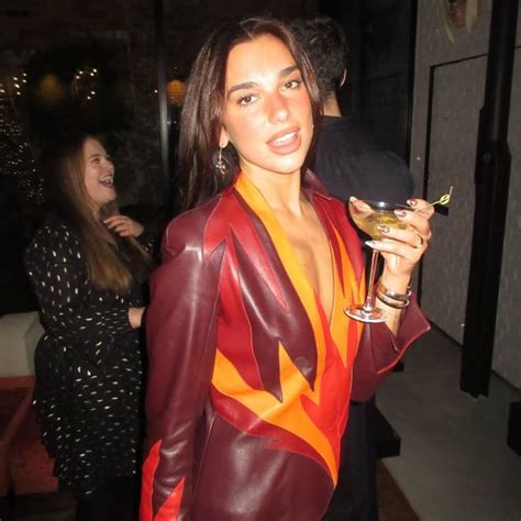 Dua Lipa Stuns In A Sheer Silver Naked Dress To Ring In 2026 Us Weekly