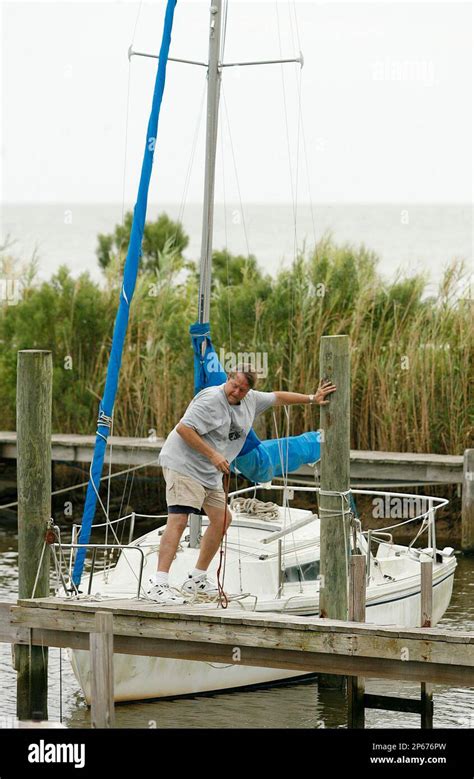 Chris Kern Secures His Sailboat At Buccaneer Yacht Club Monday Aug 27 2012 In Mobile Ala