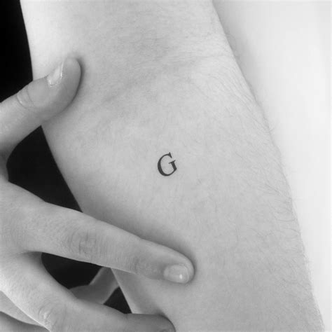 Cursive Uppercase G Tattoo