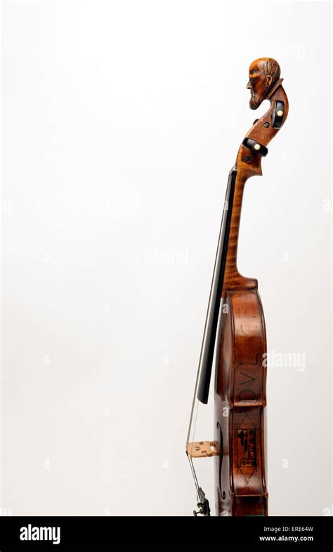 Carved Head At The Top Of A Violin Scroll Violin Labelled