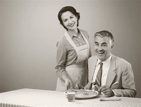 Vintage 1950s Woman Serving Dinner Royalty Free Stock Retro Young
