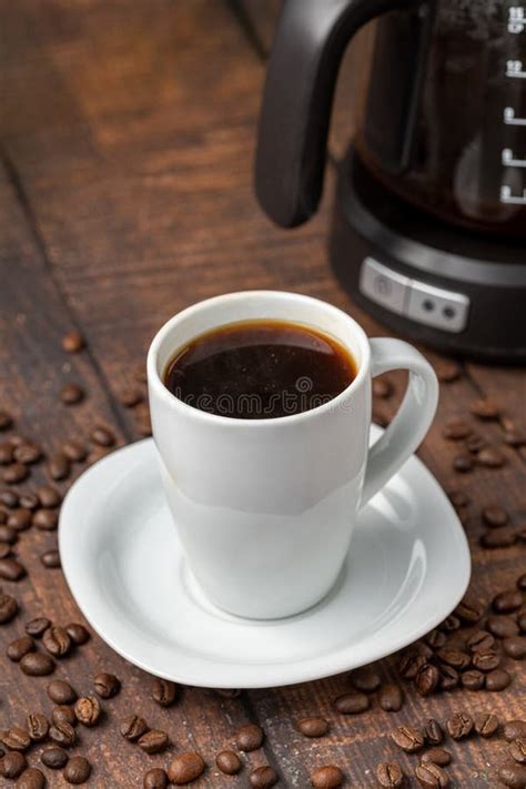 Filter Coffee Brewed In A Filter Coffee Machine In A White Porcelain