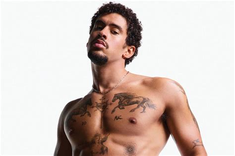 Bad Bunny Flaunts His Torso Tattoos As He Goes Shirtless For New Calvin
