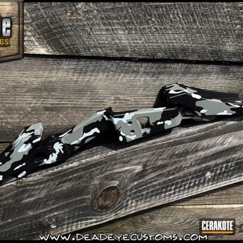 Custom Camo Bow Riser Coated With Hidden White Graphite Black And Bull Shark Grey Cerakote