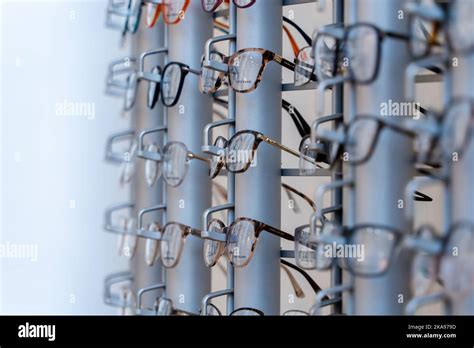 Designer Spectacles Or Glasses Frames On Display In An Opticians Store Concept Of Eyesight