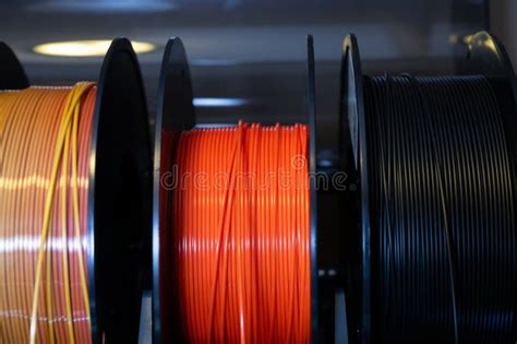 Selective Focus On Different Colored Spools Of 3d Printer Filament