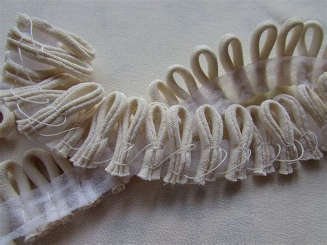 Rouleau Loops And Eylets Button Covering Services