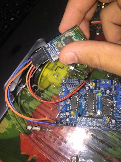 bluetooth controlled pick and place robot