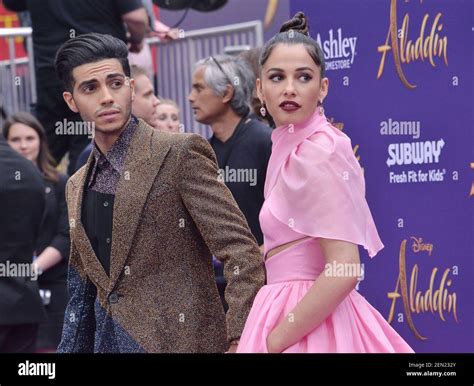 L R Mena Massoud And Naomi Scott At The Disney Aladdin Los Angeles