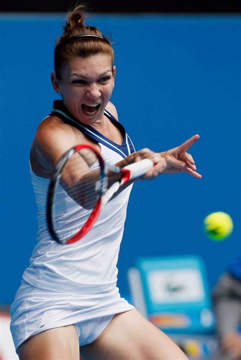 Simona Halep Of Romania Hits A Return To Jelena Jankovic Of Serbia