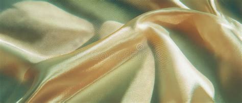 Flowing Ripples Of Soft Fabric Create An Abstract Background With