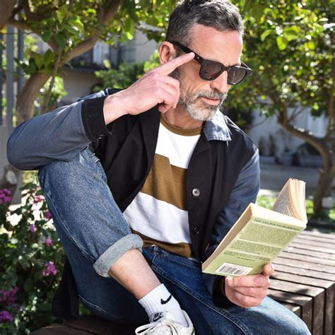 Adaptive Glasses Switch From Sunglasses To Reading Glasses With A