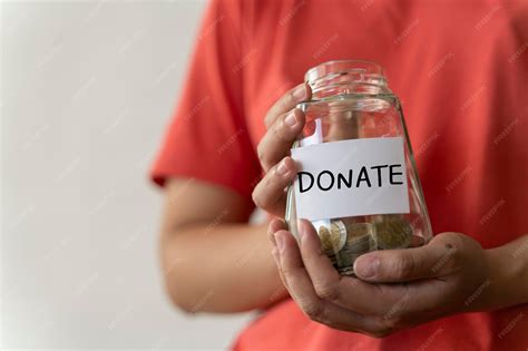 Premium Photo Woman Holding Money Jar With Donate Word Written Text